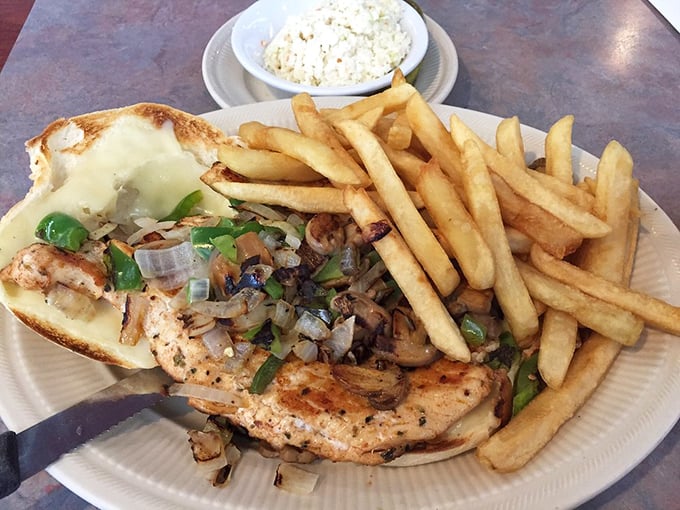 When a chicken Philly, golden fries, and coleslaw share a plate, it's not just lunch—it's an American dream team of comfort food classics.