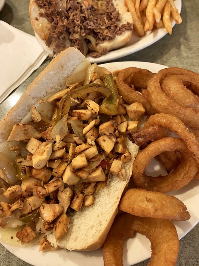 A chicken cheesesteak that doesn't need Philadelphia's permission to be absolutely magnificent, with onion rings that steal the spotlight.