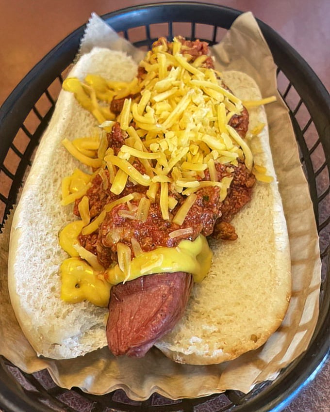 Chili, cheese, and a perfectly cooked dog—the classic combo that reminds us why some traditions deserve to be honored and devoured.