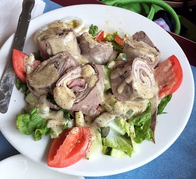 A club salad that proves healthy-ish options can still be satisfying – the Switzerland of diner menus, neutral but impressive.