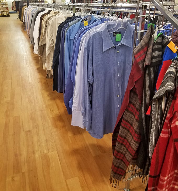 Men's shirts lined up like soldiers – from office-appropriate blues to weekend-ready plaids, all at attention for new owners.