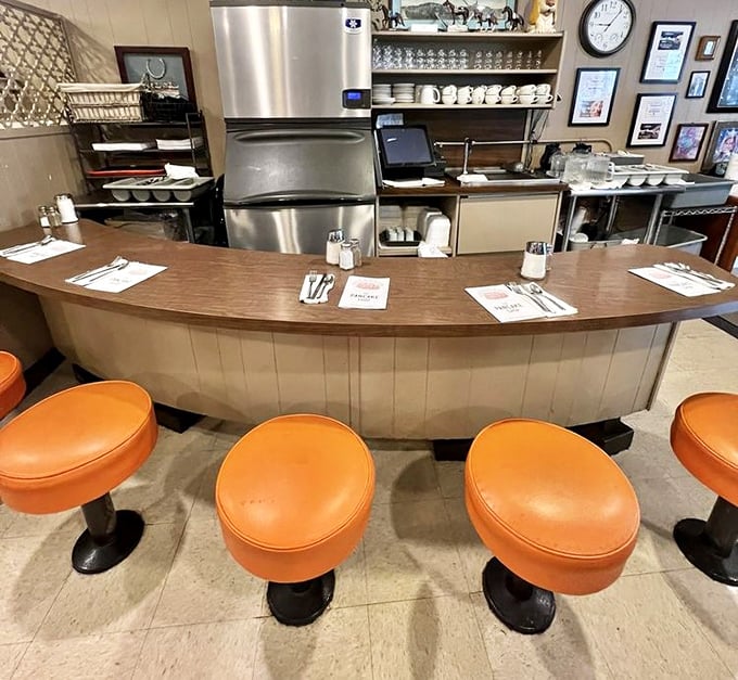 Counter seating with a front-row view of the griddle—it's like having VIP seats to the greatest breakfast show in town.