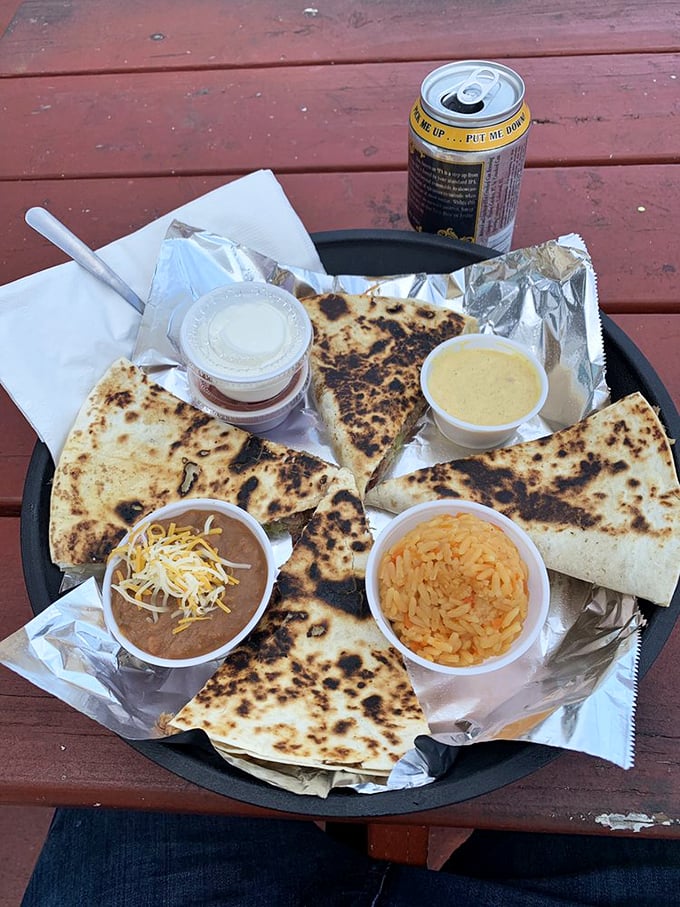 This quesadilla plate isn't just a meal—it's a choose-your-own-adventure of dips, with each triangle offering a journey to flavor town.