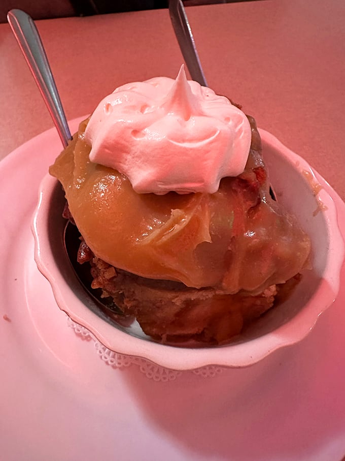 This dessert doesn't just satisfy a sweet tooth—it soothes the soul. That pink whipped cream is bringing a touch of nostalgia to the party.