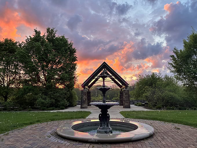 Elm Street Green's fountain catches the sunset like it was designed by a romance novelist.