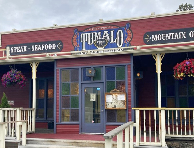 The entrance that's launched a thousand dinner plans. Those colorful stained glass windows aren't just pretty—they're your portal to flavor country.