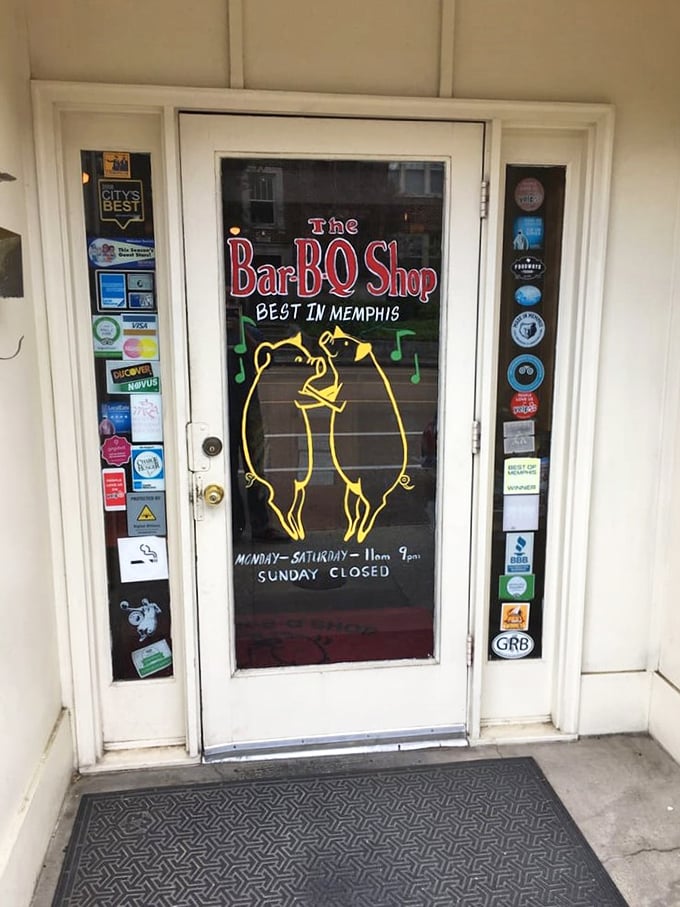 The entrance tells the whole story—awards plastered everywhere, dancing pigs on the door. They're not bragging if it's true.