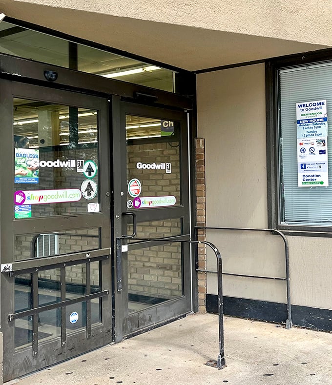 The unassuming entrance belies the wonderland within—where $45 can transform your wardrobe and support job training programs simultaneously.