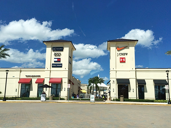 Twin towers of brand names welcome you like retail royalty, rising against Florida’s impossibly blue sky and promising treasures within.