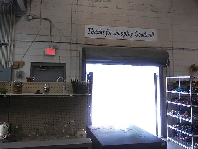 Thanks for shopping Goodwill—the final farewell as you exit with your bounty. That bright light isn't heaven; it's just the Mississippi sun greeting your successful hunt.
