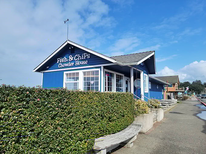 The blue Fish & Chips Chowder House stands like a beacon of comfort food – promising the kind of meal that makes you forget about your diet.
