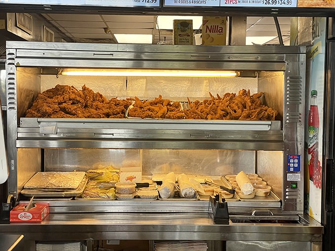 Behold the warming station—where golden-fried treasures wait patiently for their moment to shine on your plate.