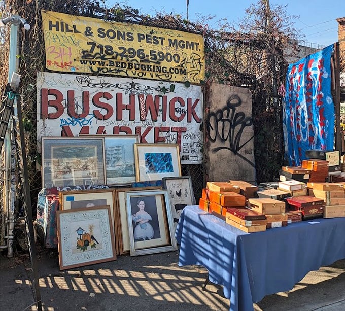 The market's weathered sign stands guard over framed artwork and memories, Brooklyn's past and present in perfect harmony.
