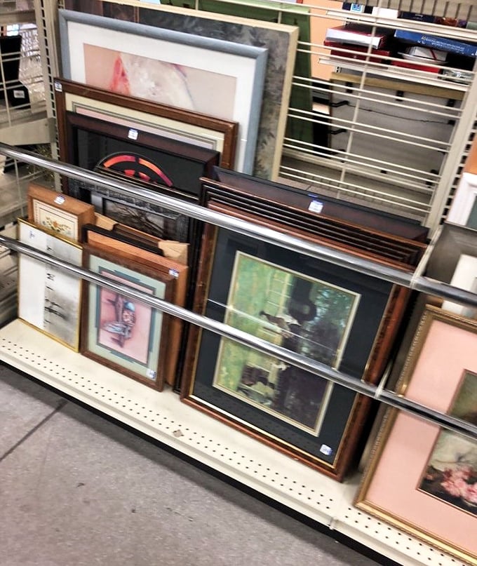 Framed art leans casually against shelves, offering instant home décor without the gallery prices or pretentious descriptions.