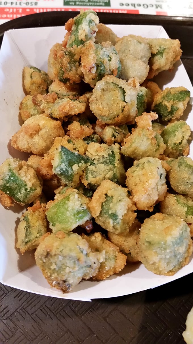 Fried okra – those golden-battered Southern gems that prove vegetables can be just as indulgent as dessert when treated with proper respect.