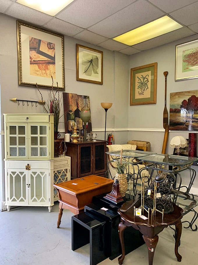 The furniture room's sophisticated corner. That white cabinet could hold your grandmother's china or become your new bar—versatility at its finest.