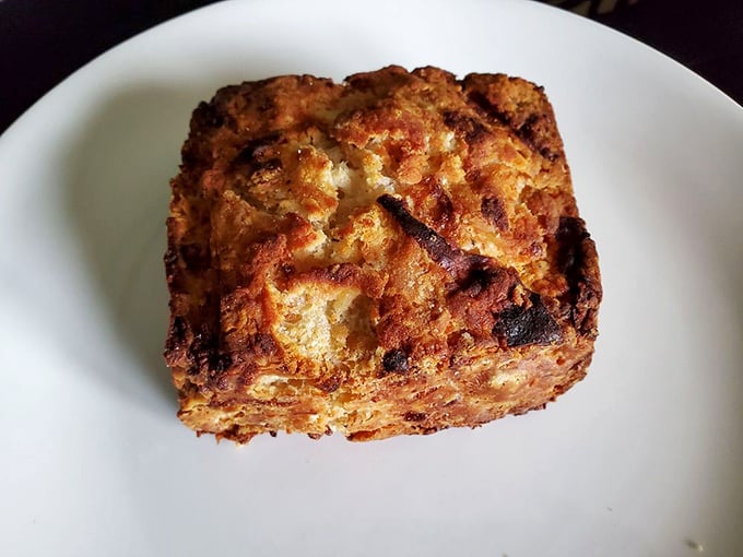 This isn't just a biscuit—it's a savory monument to garlic and cheese that makes you question why you ever settled for those tubes of dough.