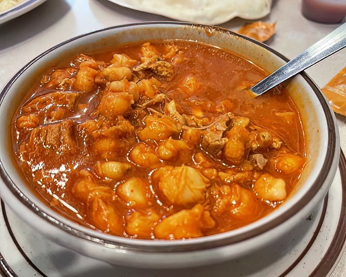 The legendary green chile stew – chunks of potato and meat swimming in a broth so flavorful it should be classified as a controlled substance.