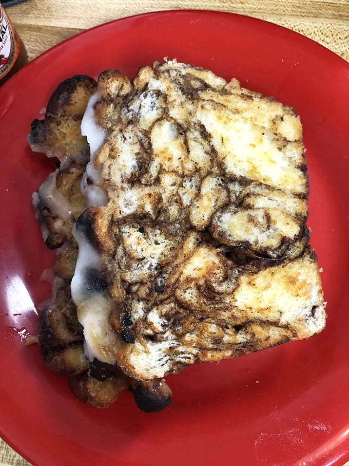 Grilled cinnamon swirl bread transformed into a sandwich that blurs the line between breakfast and dessert—a sweet rebellion against boring food that Michigan has embraced wholeheartedly.