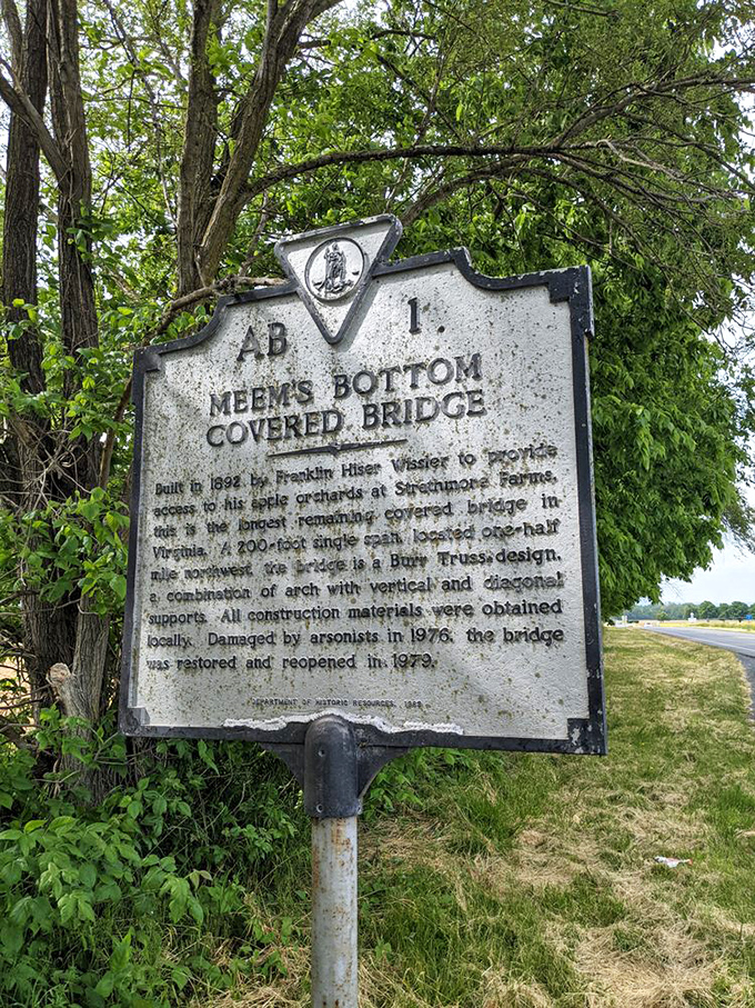 History condensed into a roadside marker—the cliff notes version of a story that deserves a full novel. Built 1892, burned 1976, reborn 1979.