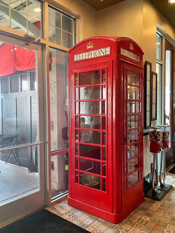 A classic British phone booth stands guard inside—perhaps for emergency calls to your stomach when it demands seconds.