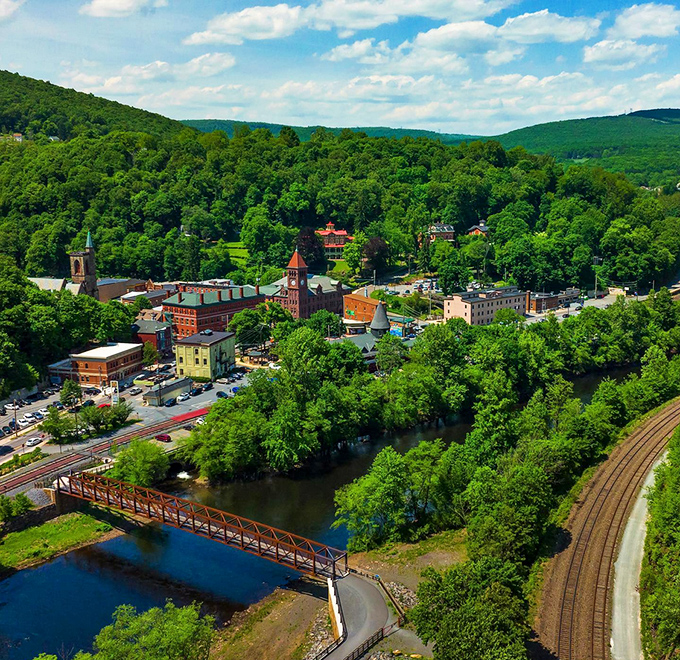 Jim Thorpe from above reveals its perfect placement—a Victorian jewel box set carefully between mountains and wrapped by the Lehigh River.
