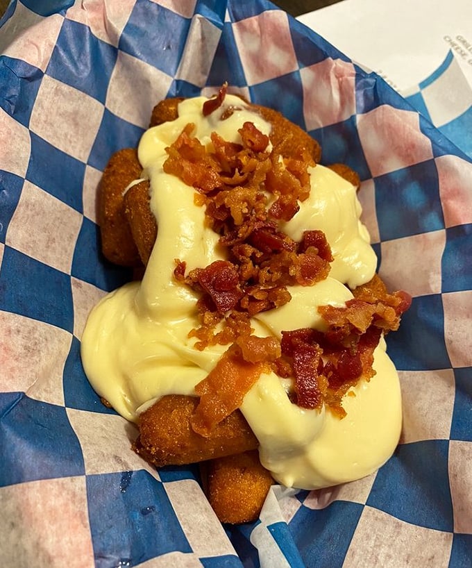 Hush puppies loaded with cheese and bacon—because sometimes the sidekick steals the show, and nobody's complaining.