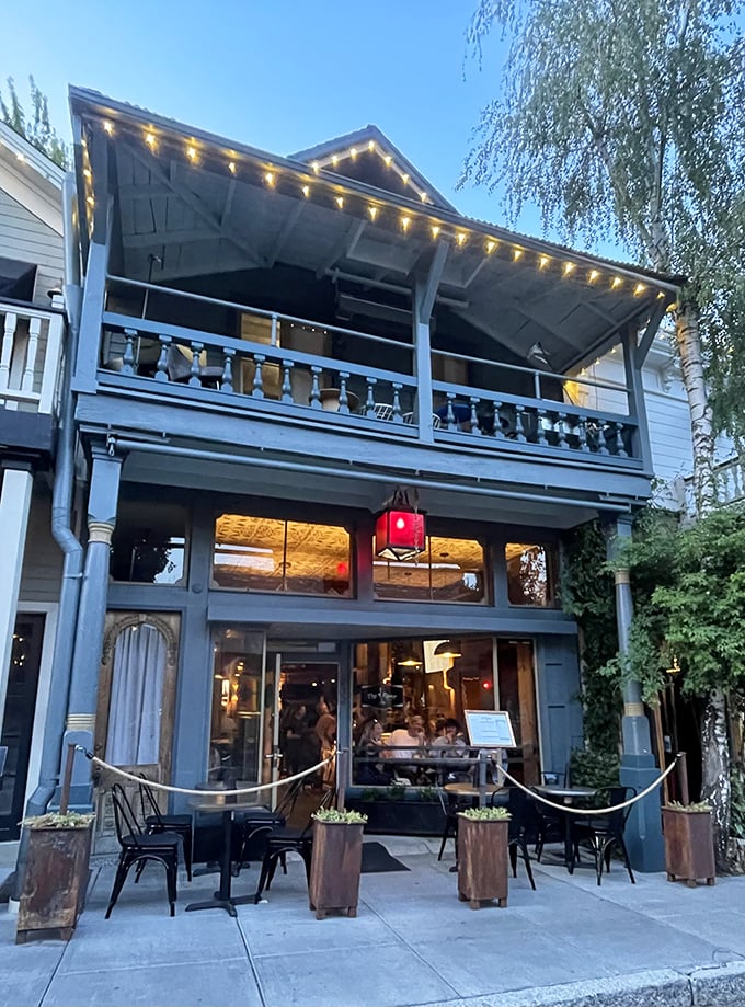 String lights twinkle above this historic building-turned-restaurant, where evening diners enjoy Sierra hospitality on a balmy California night.