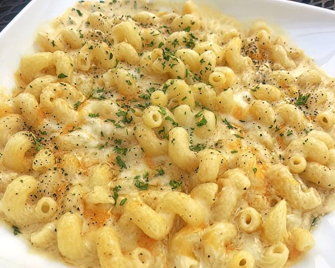 Mac and cheese elevated from childhood memory to grown-up indulgence – comfort food that's dressed for a night on the town.