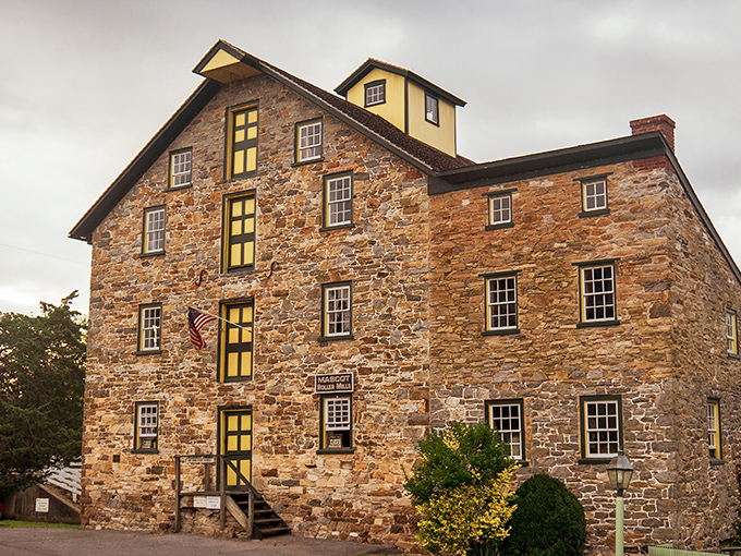 The historic stone Mascot Roller Mills stands as a testament to Pennsylvania's industrial heritage, its sturdy walls having weathered centuries of change.