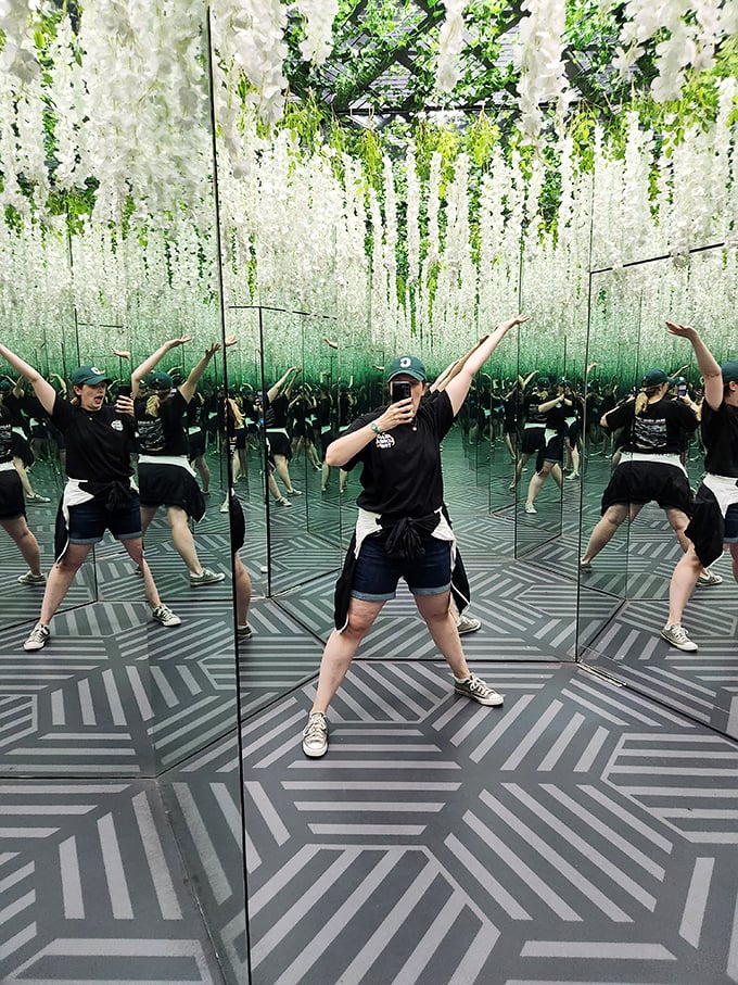 Infinite reflections create an army of doppelgängers in the mirror room. One visitor becomes many in this Instagram-ready hall of endless selves.
