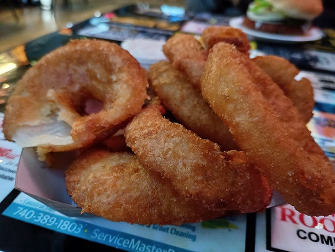 Golden, crispy onion rings that shatter with each bite – the perfect sidekick to any sandwich on the menu.