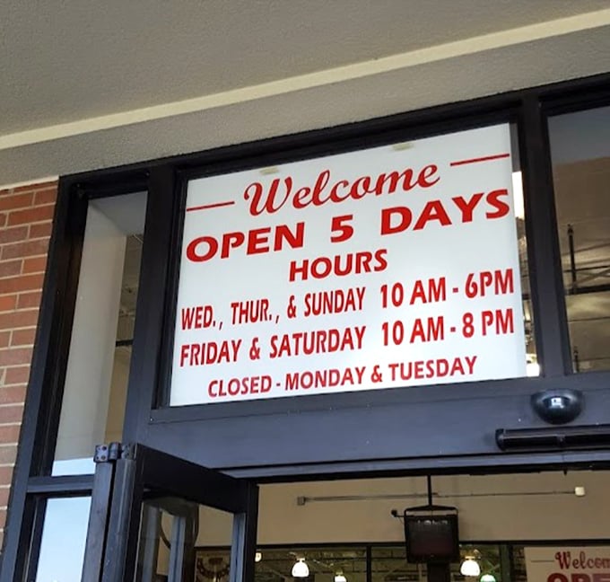 The welcoming hours sign serves as your invitation to this five-day-a-week treasure hunt. Plan accordingly—discoveries await Wednesday through Sunday!