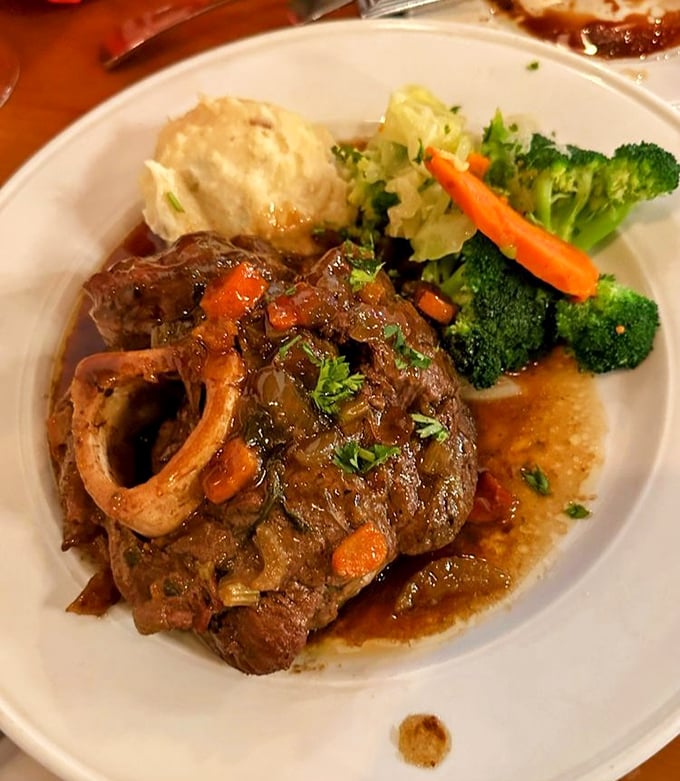 Osso Buco that doesn't just fall off the bone—it practically leaps onto your fork, surrounded by vegetables that have found their perfect dinner companion.