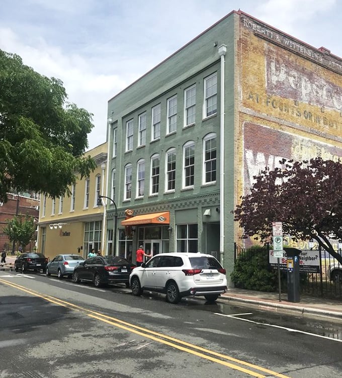 Historic buildings with stories to tell—Bull City Burger and Brewery's green facade fits perfectly into Durham's architectural tapestry while writing its own delicious chapter.