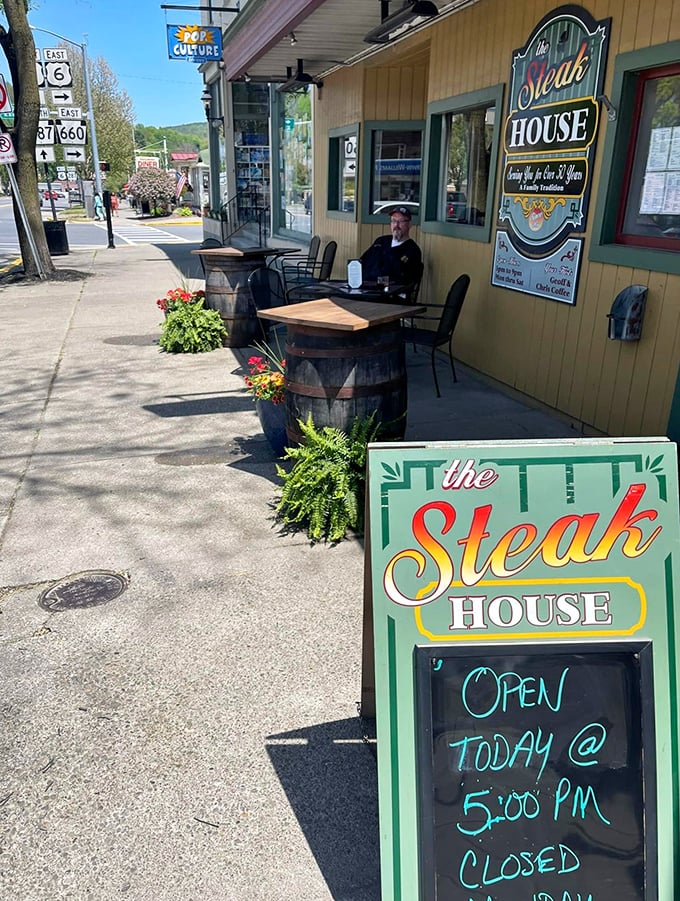 Sidewalk dining with barrel tables and potted plants—because sometimes the best appetizer is a dose of small-town charm.