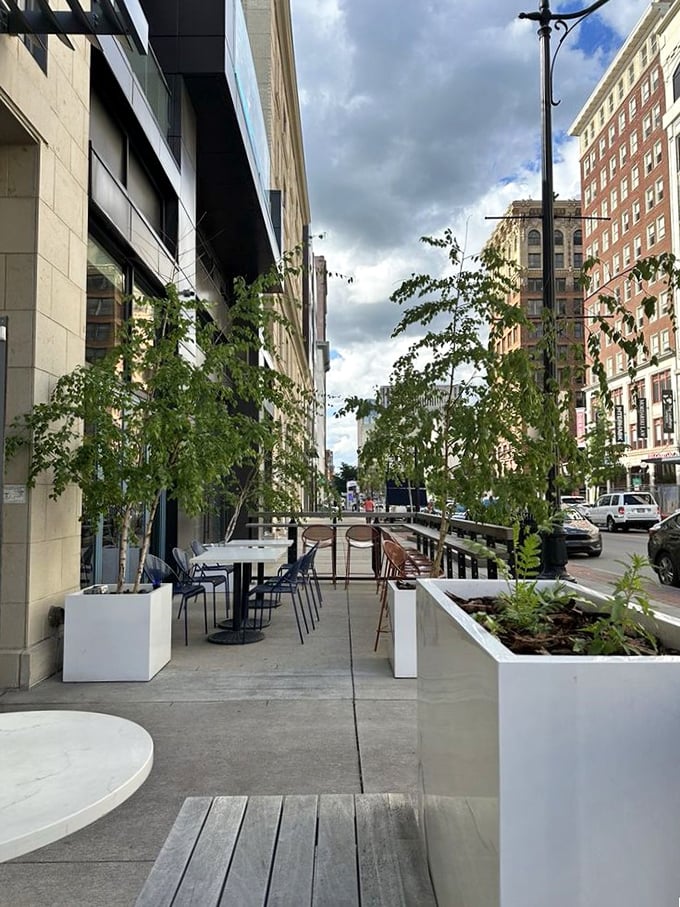Downtown Columbus provides the perfect backdrop for Speck's outdoor seating area. Urban dining with enough greenery to make you forget you're in a city.