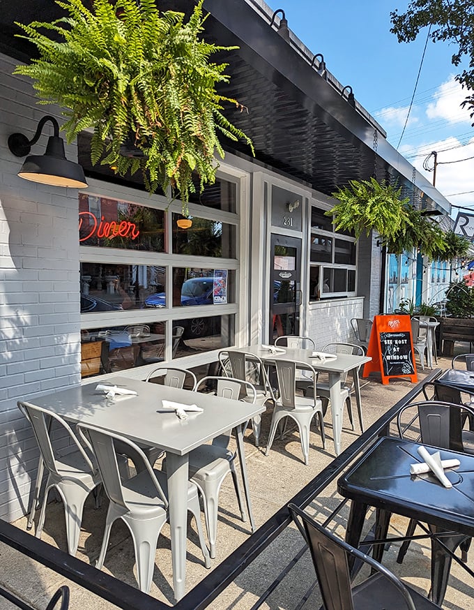 The outdoor seating area isn't just tables and chairs – it's front-row tickets to Milford's charming Main Street and a perfect spot for people-watching.