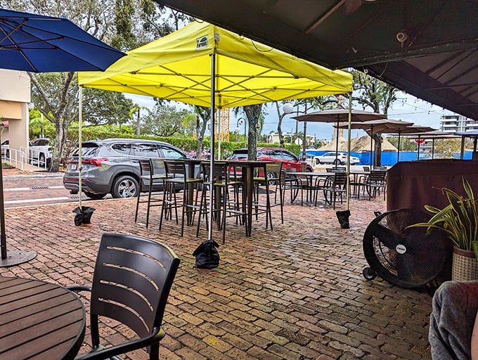 The outdoor seating area—where Florida's gentle breezes make alfresco dining possible when the rest of the country is shoveling snow.