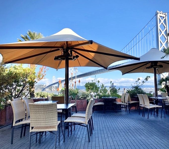 The outdoor patio where the Bay Bridge isn't just a view – it's practically part of the table setting, making even tourists feel like locals.