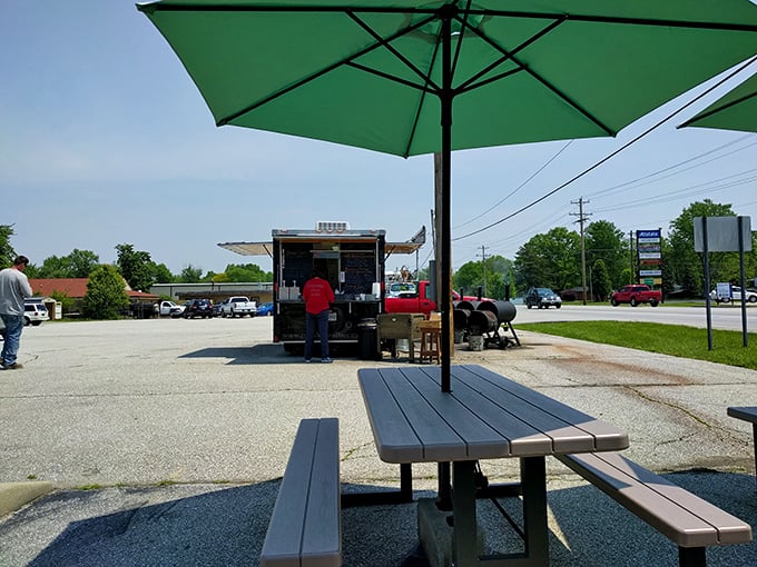 Al fresco BBQ – because sometimes you need sunshine with your smoke. The picnic table: nature's dining room for carnivores.