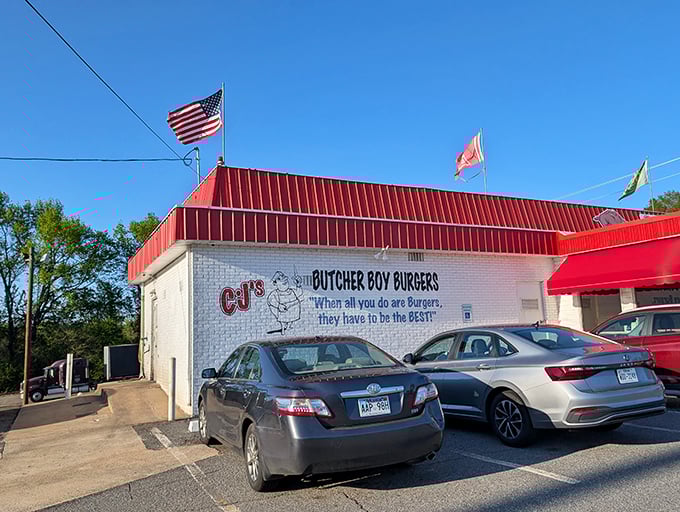 American flags flutter above CJ's like patriotic approval of what might be the most American meal in Arkansas.