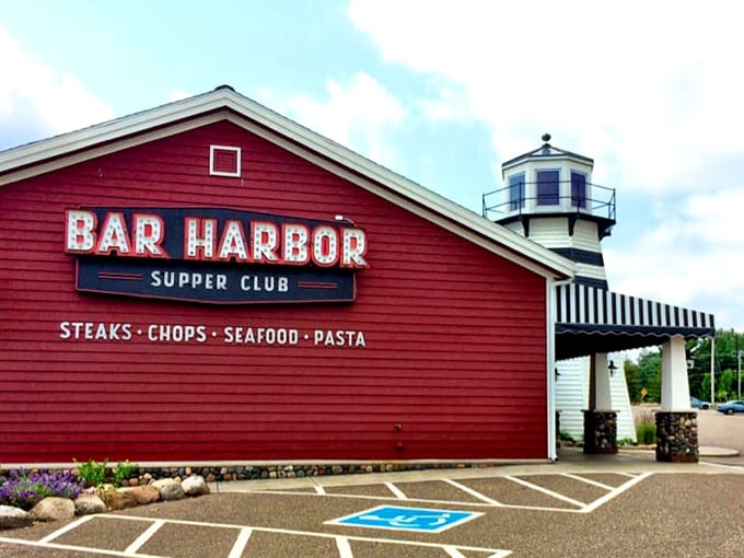 That classic red exterior with lighthouse attachment isn't just architecture—it's a promise that something special awaits inside.