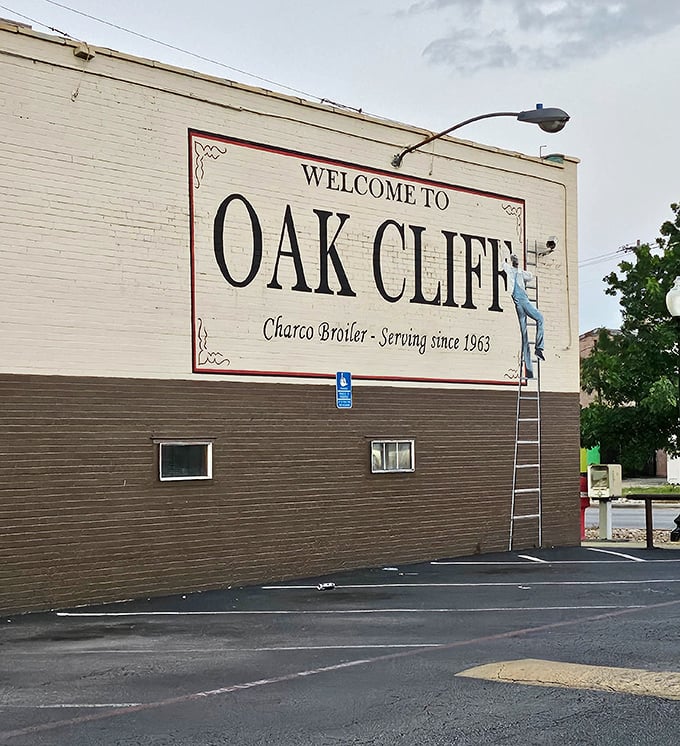 The "Welcome to Oak Cliff" mural reminds you this isn't just any steakhouse—it's a neighborhood institution since 1963.