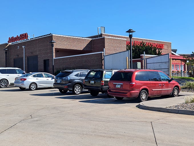 The unassuming exterior hides barbecue greatness within – like finding a pitmaster's secret location that happens to have plenty of parking.