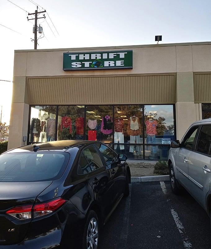 The unassuming storefront belies the treasure cave within – like a speakeasy for bargain hunters with an eye for potential.