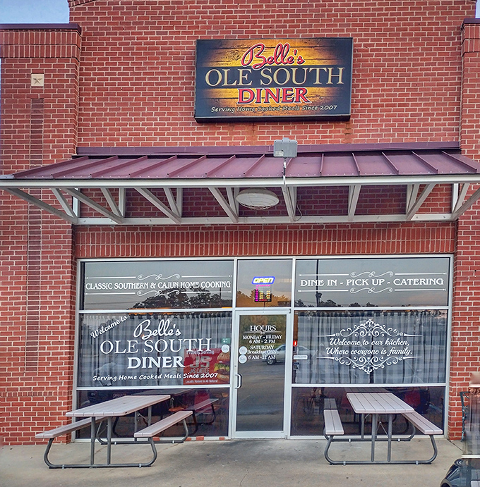 The brick exterior of Belle's Ole South Diner stands as a beacon of hope for hungry travelers and locals alike—Southern comfort awaits inside. 