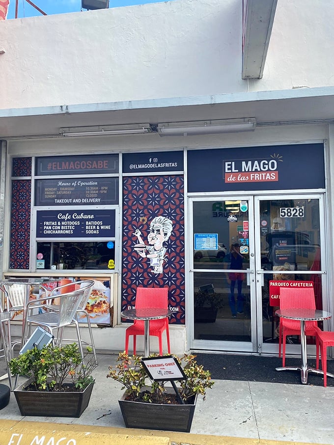 Those red chairs outside aren't just seating—they're Miami's version of front-row tickets to the sidewalk parade of Little Havana life.