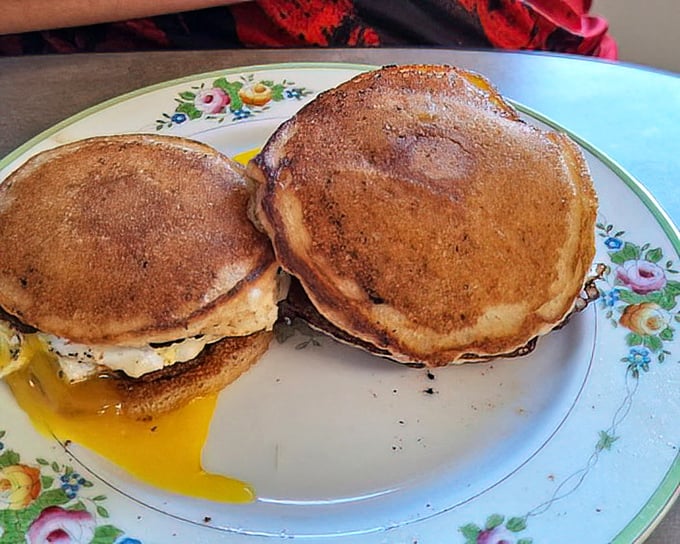 The pancake sandwich—where maple syrup creates the perfect sweet-savory handshake between breakfast's greatest hits.