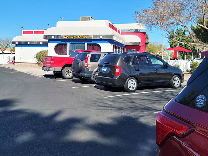 The parking lot—where hungry patrons arrive as strangers and leave as satisfied members of the Chase's fan club.